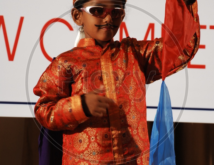 Image of Indian Girl Child Performing Magic tricks-KT999896-Picxy