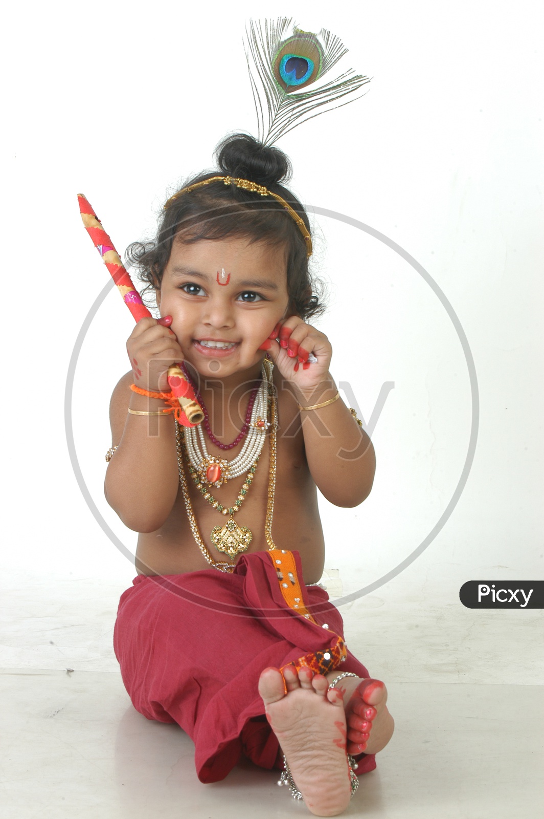 Image of A Cute Indian Boy in a Hindu God Sri Krishna Getup-JY636012-Picxy