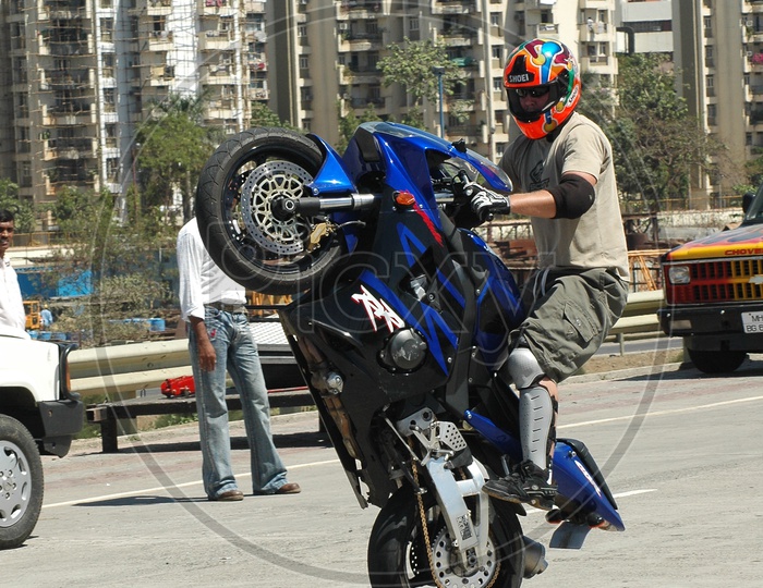 Image of Bike Stunts Performing By a Professional For a Movie Sequence ...