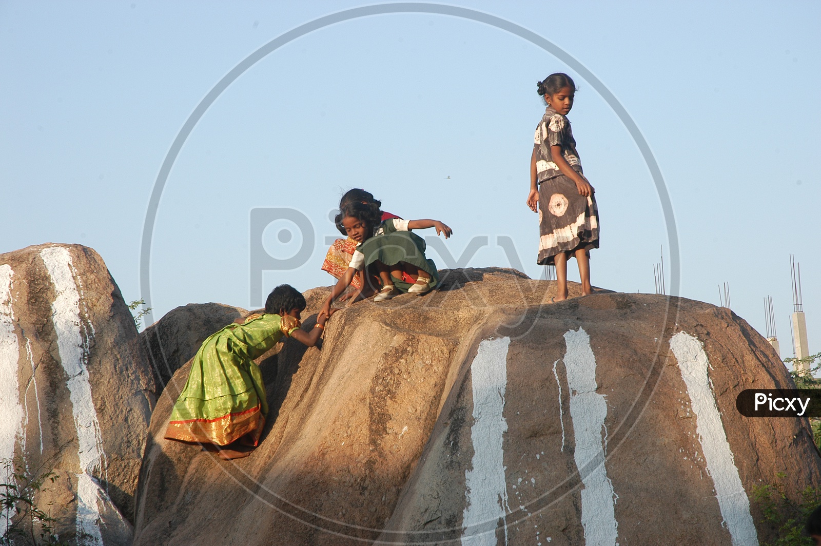 Image of Children on the rocks-IU070261-Picxy