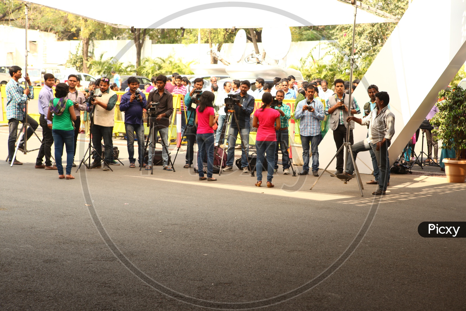 Image of Media People Waiting Outside a Building For News Coverage ...