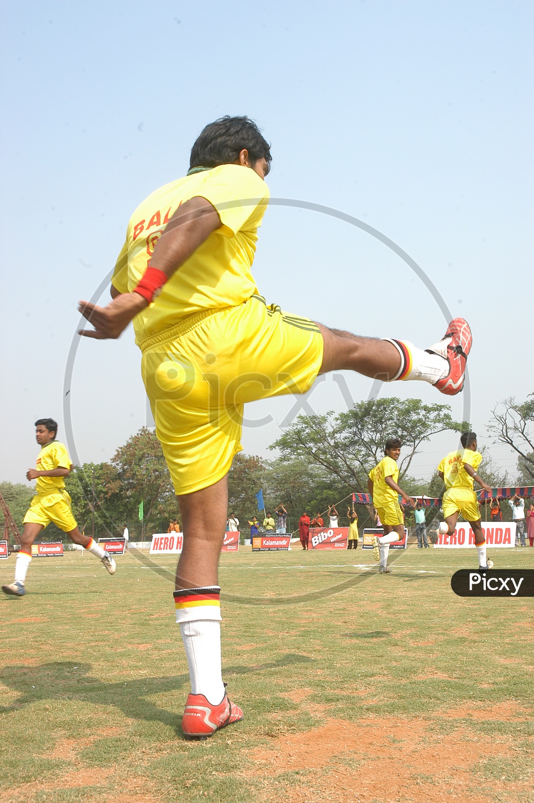Image of Telugu Movie Actors playing Football-YA194516-Picxy