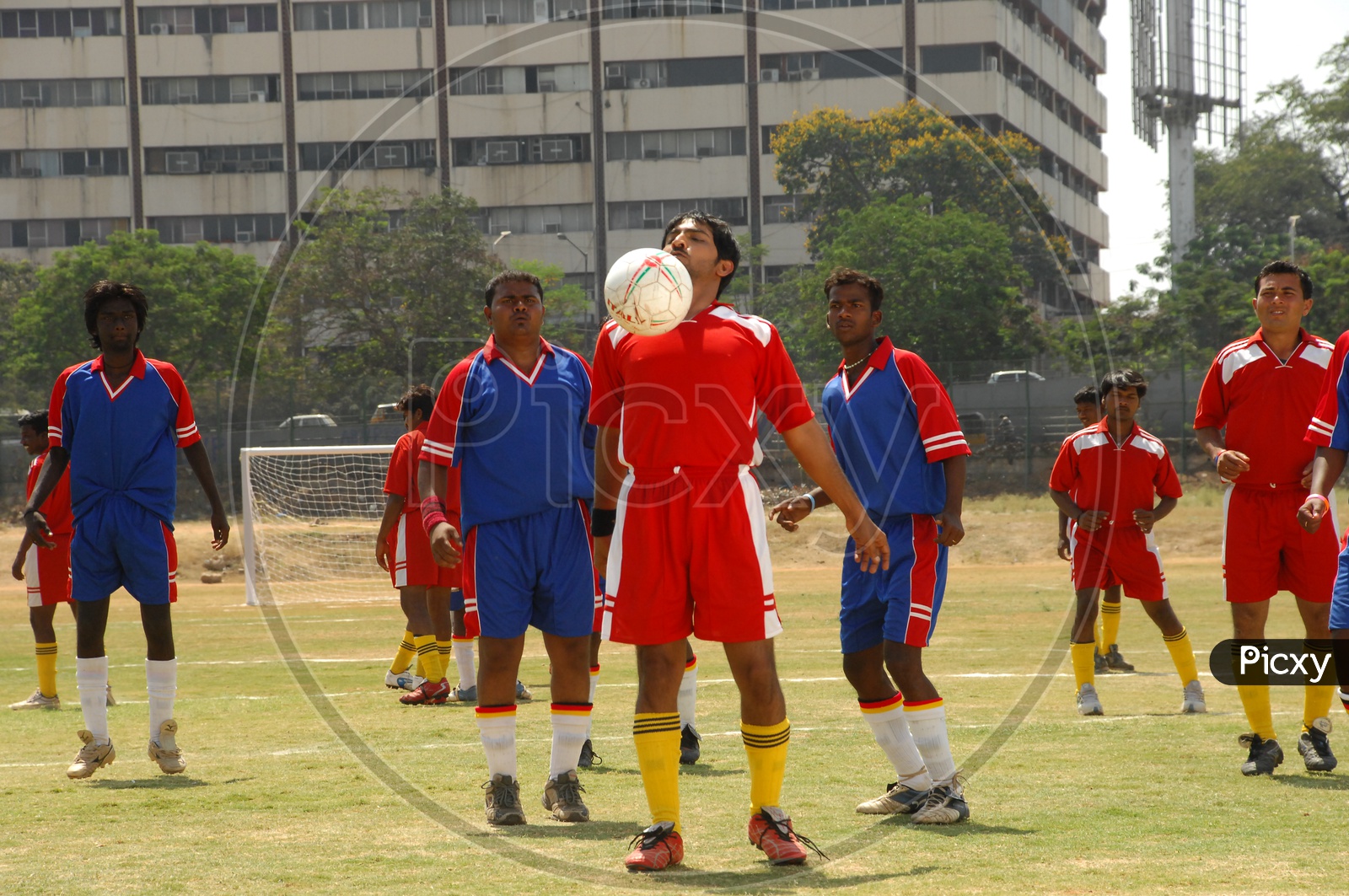 Image of Telugu Movie Actors playing Football-BZ519667-Picxy