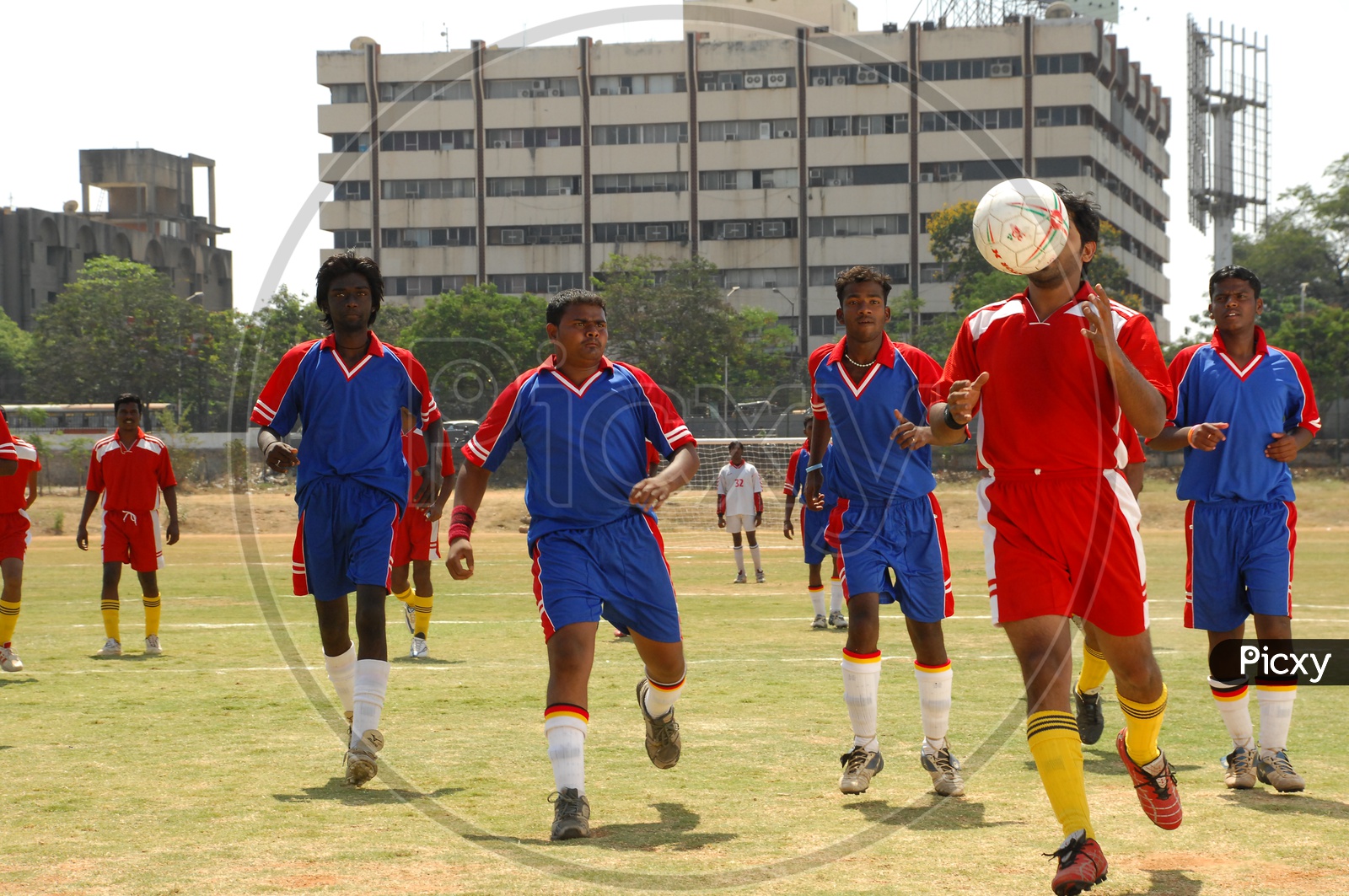 Image of Telugu Movie Actors playing Football-YO114332-Picxy