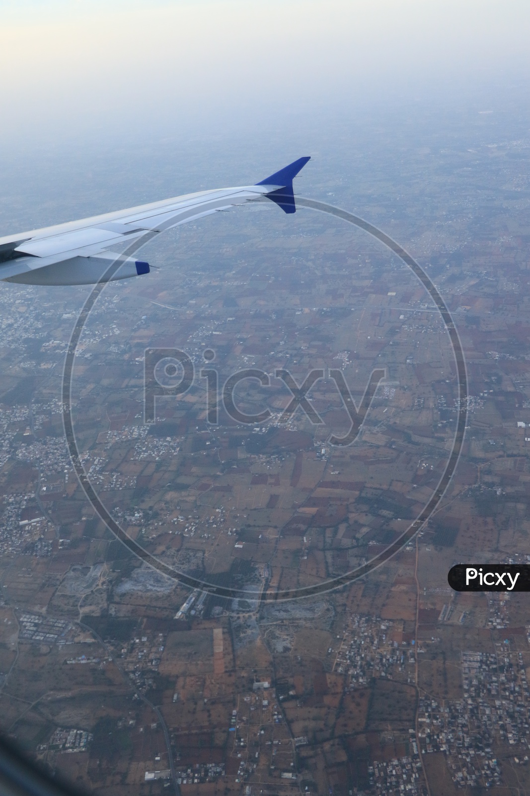 Image of Aerial View of Port Blair with Airplane wing-FW941294-Picxy