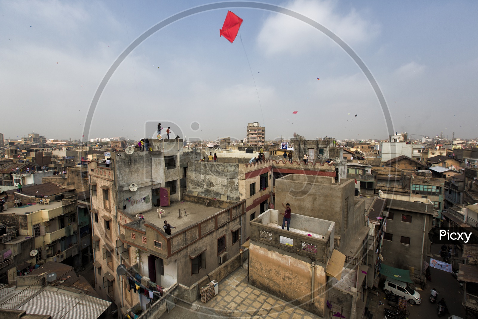 Image of Indians Flying Kites On Their House Terrace in Gujarat ...