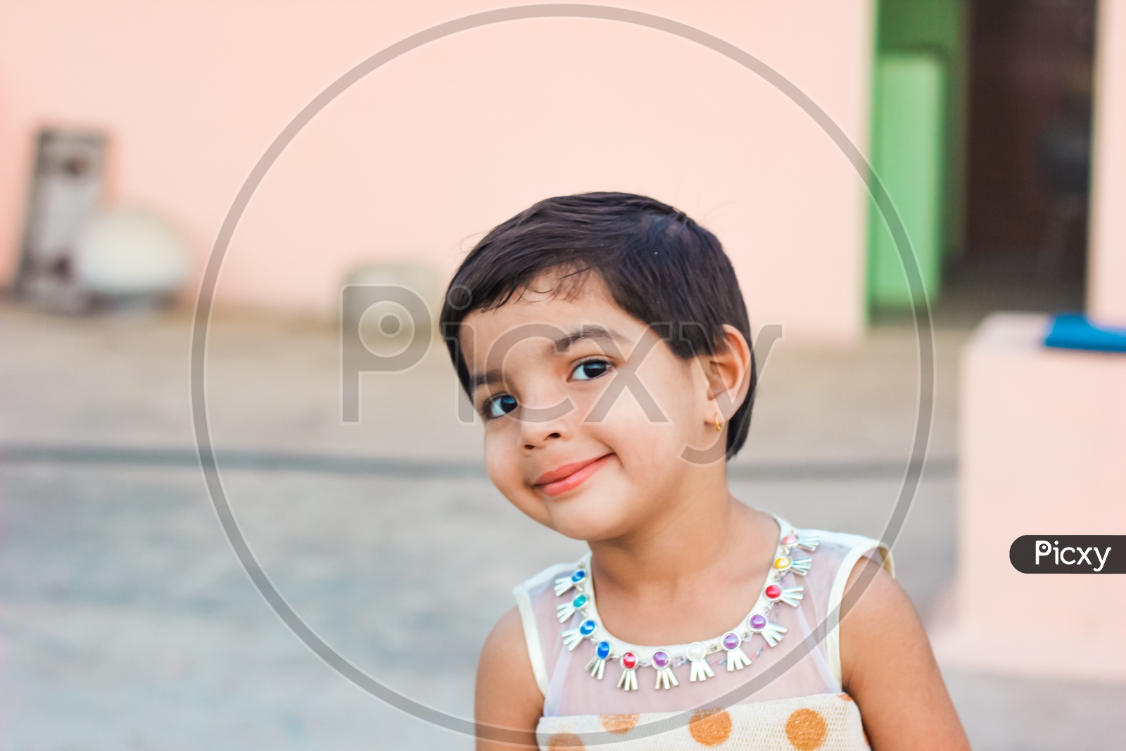 Image of Indian Girl Child With Smiling Face Closeup Shot-QR838495-Picxy