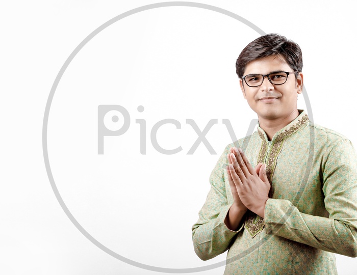 Image of Indian Young Man In Traditional Attire Saying Namaste On An ...