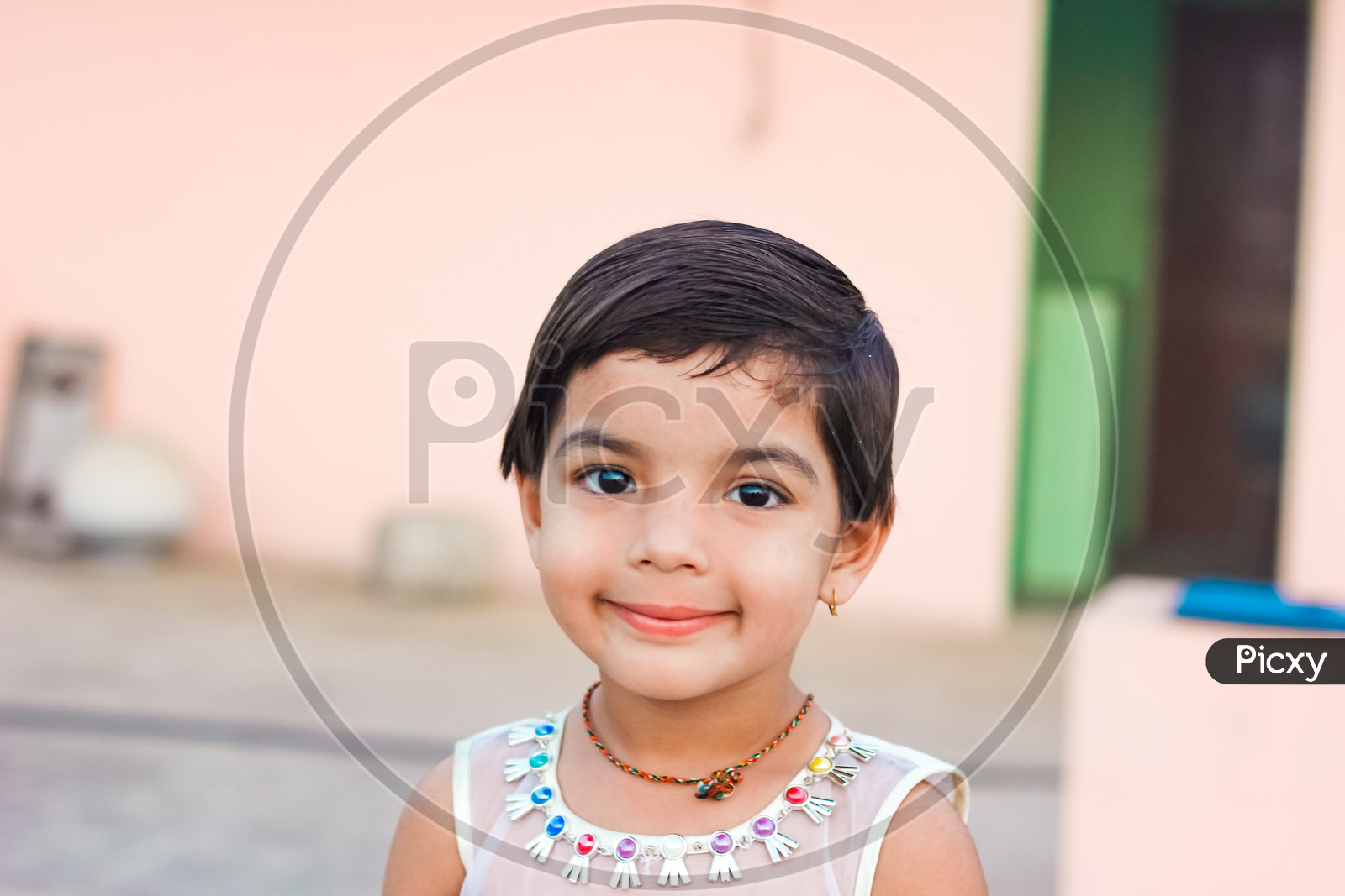 Image of Indian Girl Child With Smiling Face Closeup Shot-SD711158-Picxy