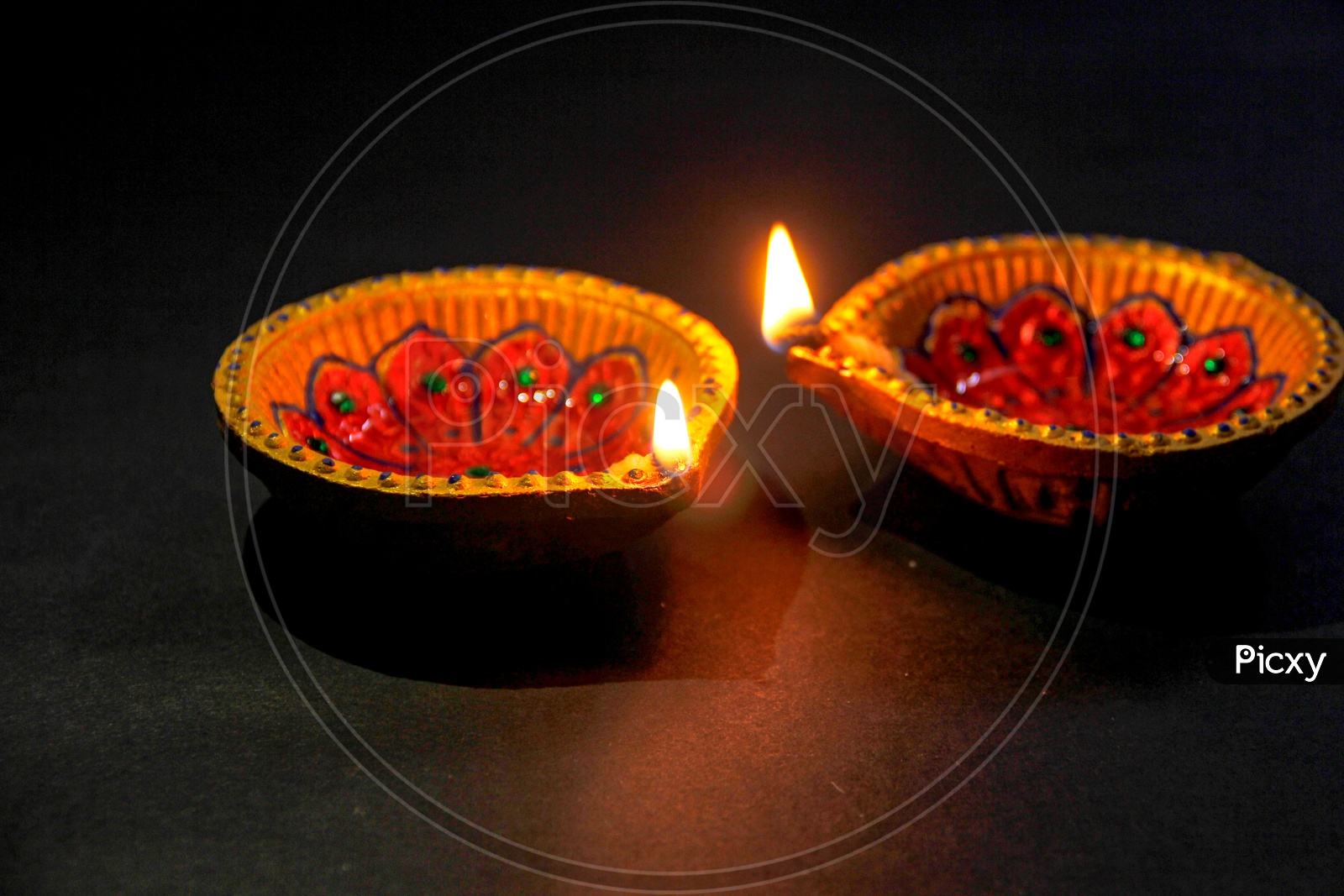 Image of Diwali Indian Festival Diya or lamp with black background ...