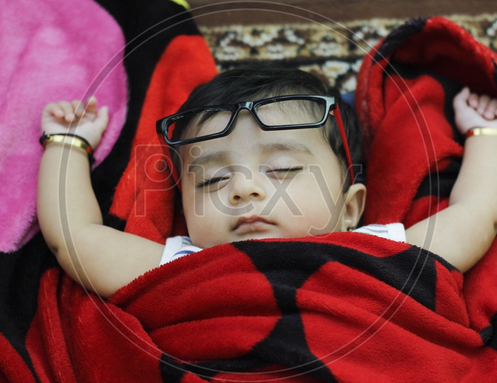 Image of Indian Cute Baby Boy Sleeping Closeup Shot-RE369704-Picxy