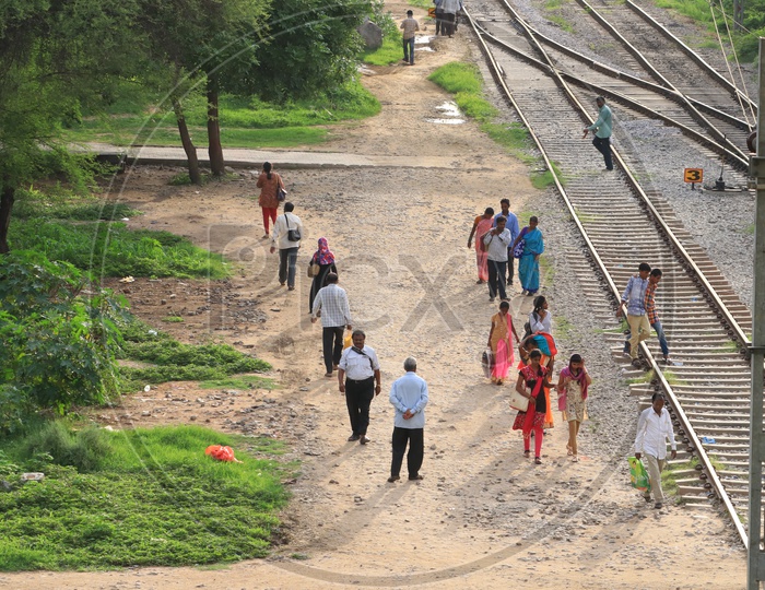 Image of Passengers / Pedestrians Walking Along The Track Side-FV481426 ...