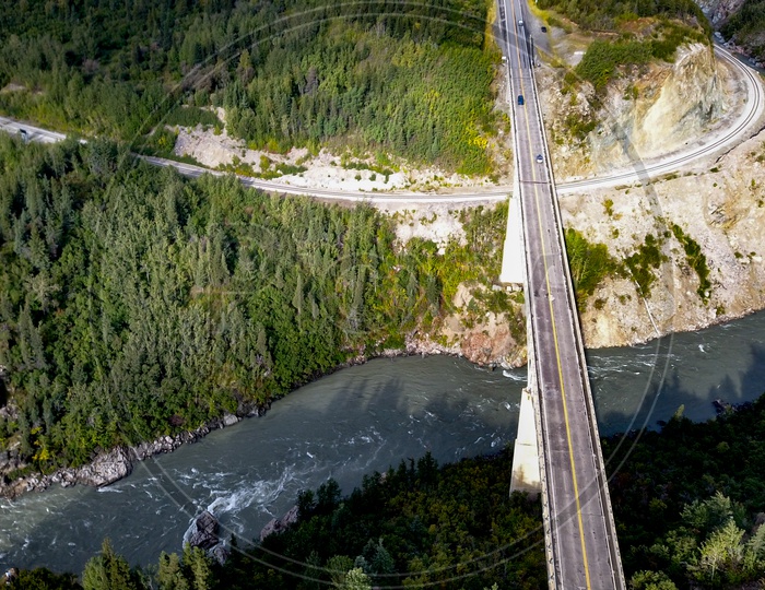 Image of Bridge and River Flow-UV469362-Picxy