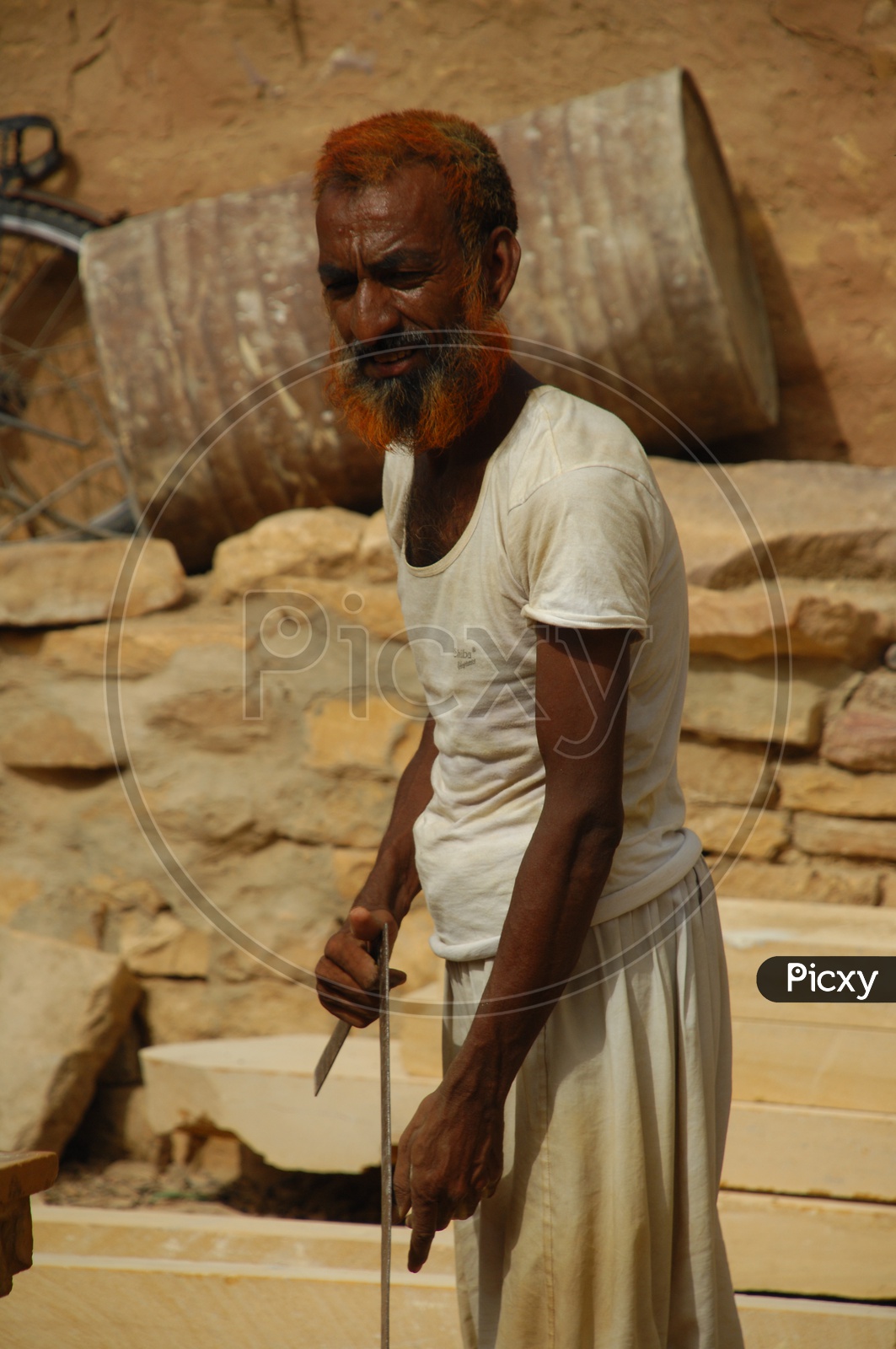 Image of Indian Man at work place-GQ977144-Picxy