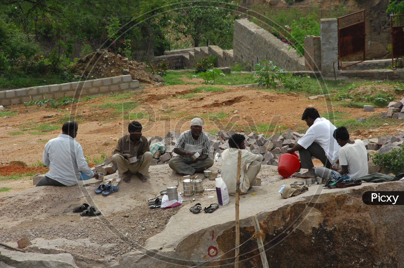 Image of Indian Daily workers Having Their Lunch At a Construction Site ...