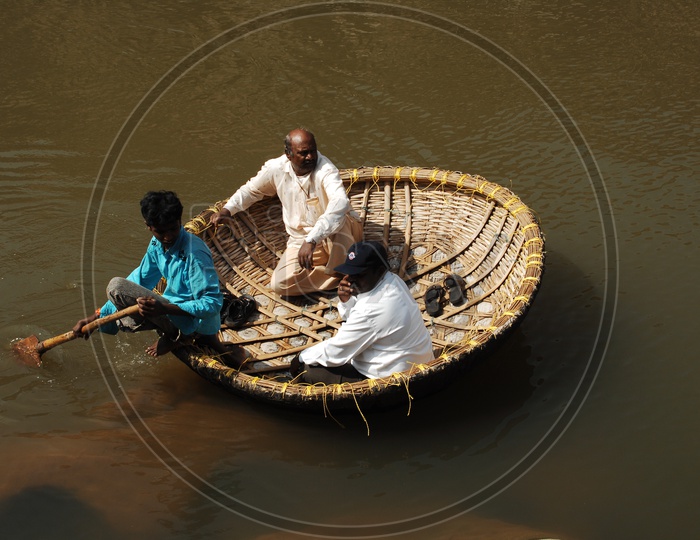 Image of Indian People Sailing on Coracle-IE299772-Picxy