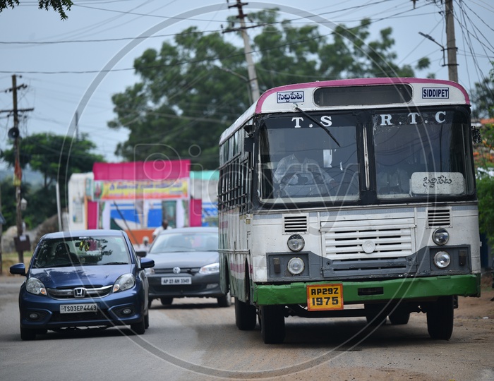 Image of An RTC Bus being driven by a private driver as the TSRTC ...