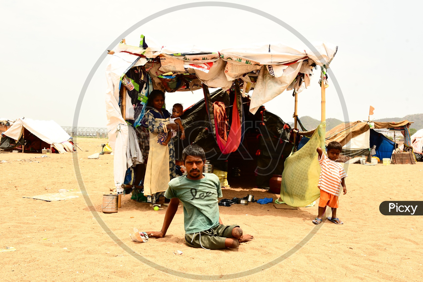Image of Indian Physically Handicapped Man with his family-QO519405-Picxy