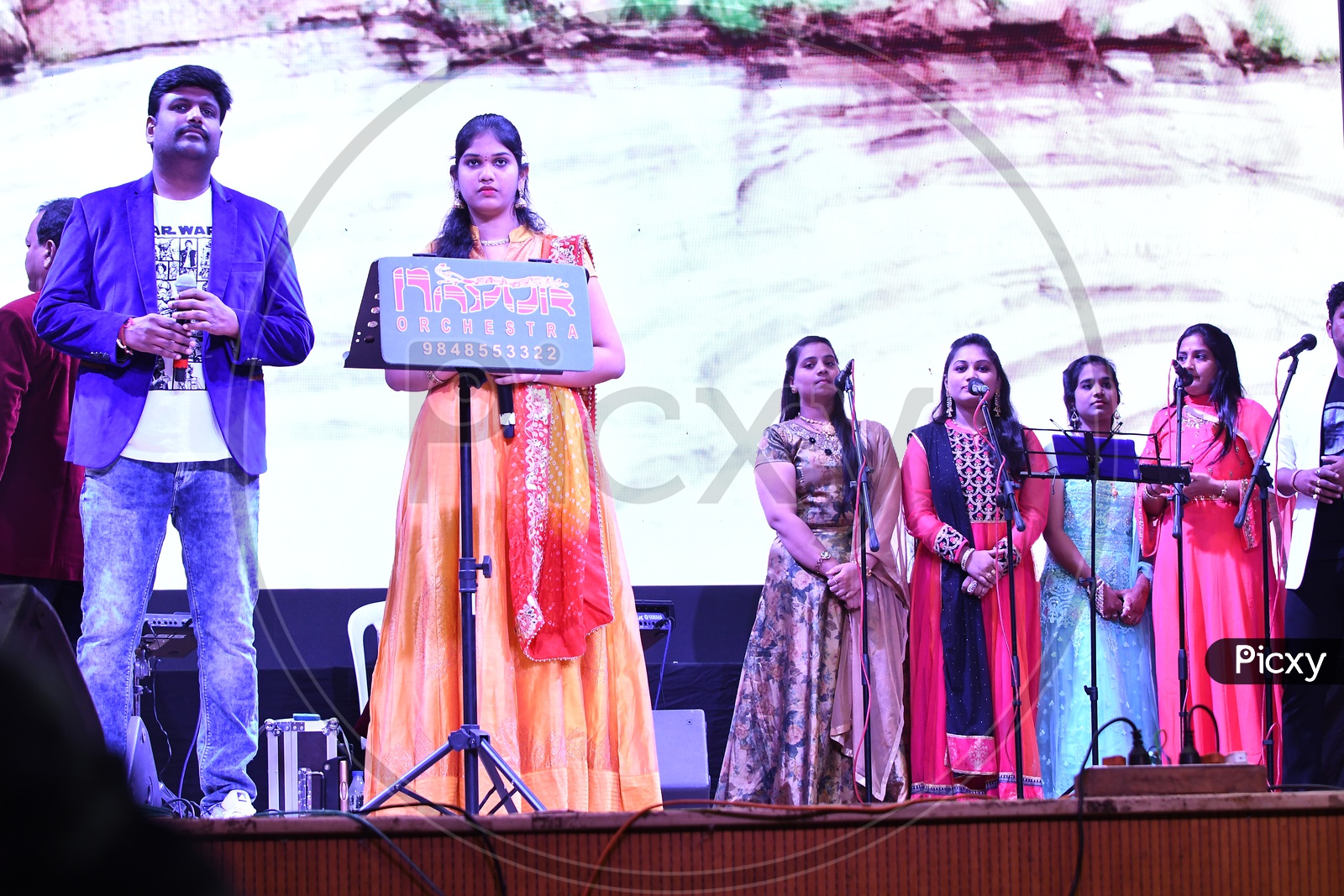Image of Playback Singers Singing on Stage At an Event-VR210115-Picxy