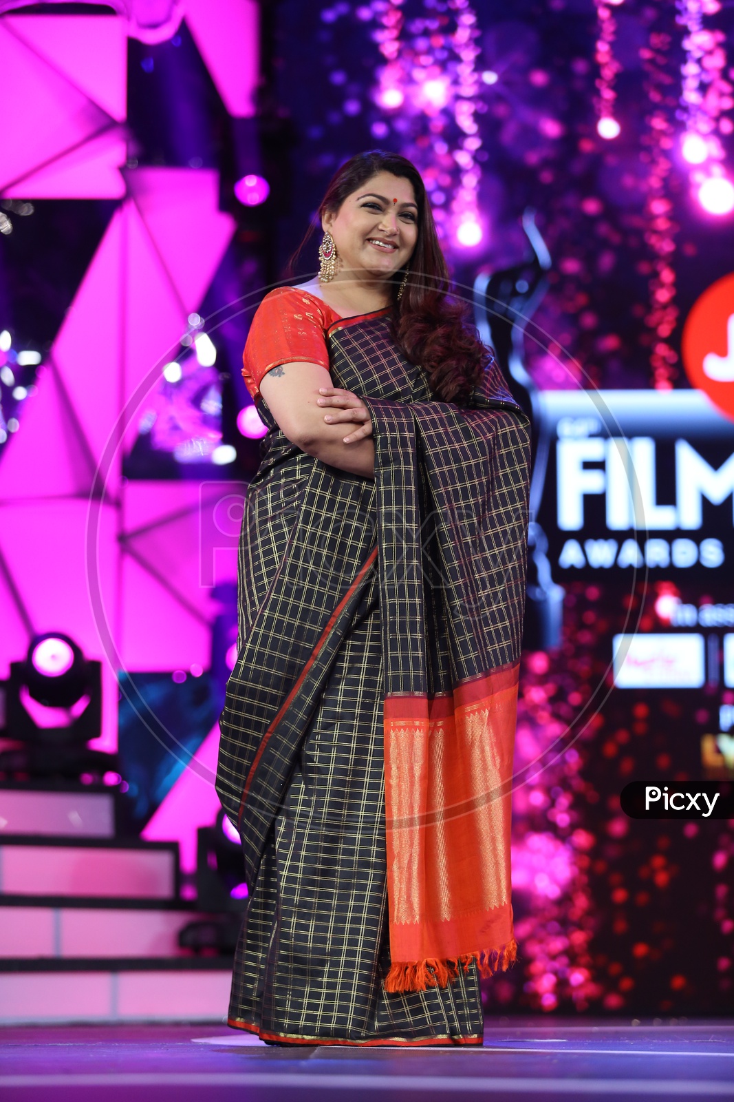 Image of Tollywood Former Actress Khusboo standing on the stage ...