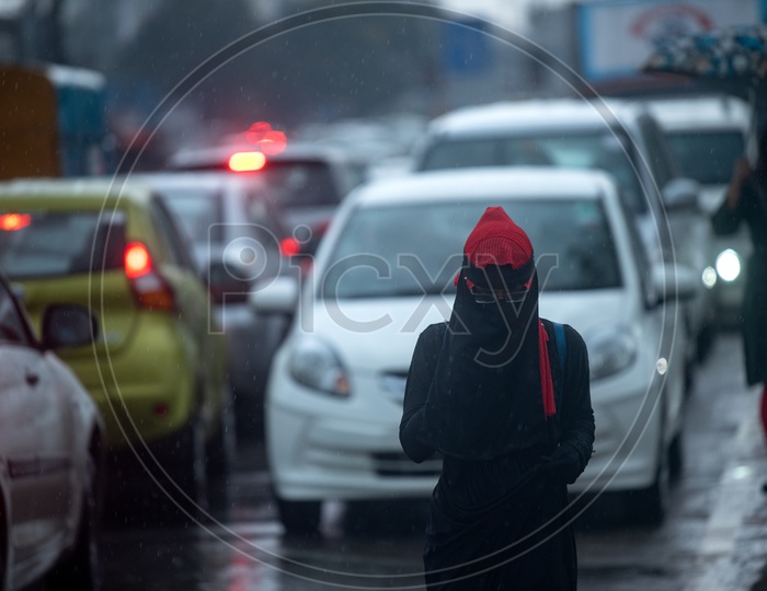 Image of Commuters Struggles on Flooded Roads During Heavy Rain Near Hi ...