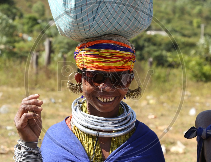 Image of Portrait Of a Bonda Tribe Woman Wearing Sun Glasses Offered by ...