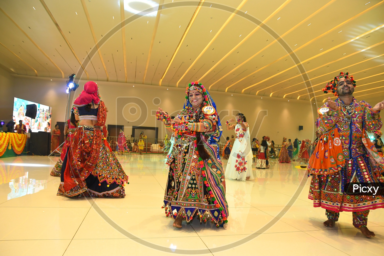 Image of Beautiful Indian Girls Playing Dandiya Dance At Garba Dandiya ...