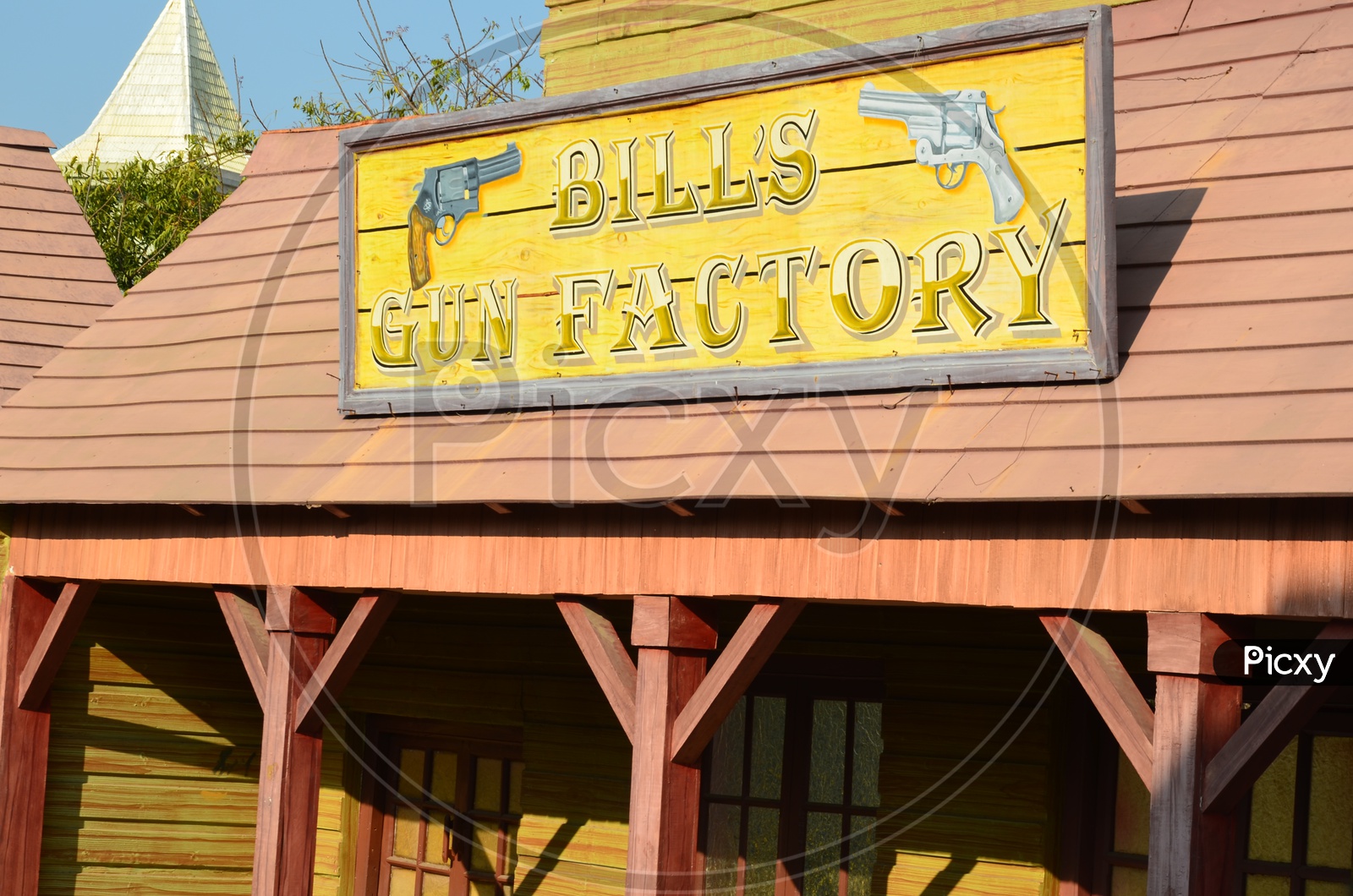 Image of Cow Boy Village Setup With Guns Factory Name Board-RM184967-Picxy