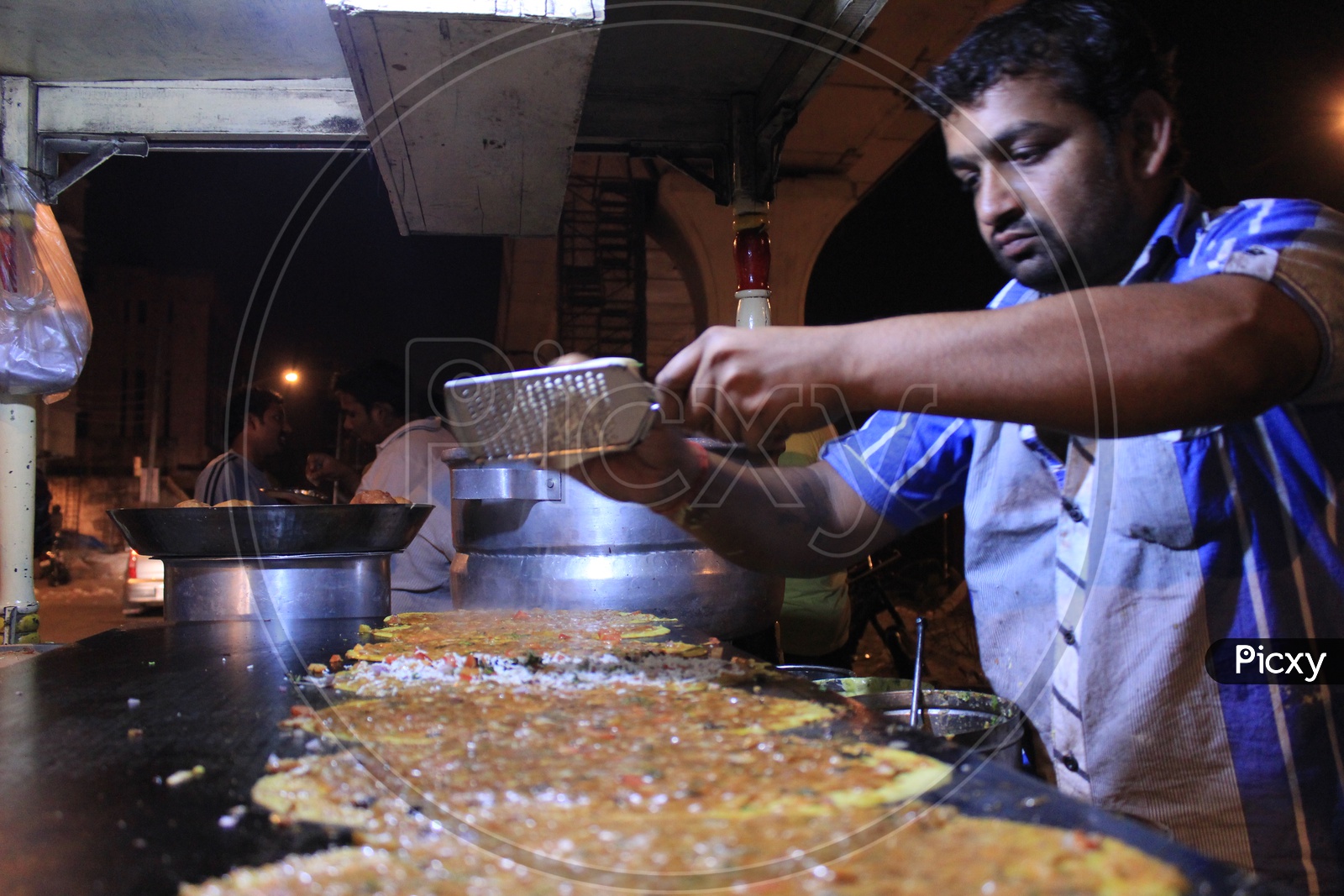 Image of Man Preparing Dosa at A Famous Dosa Stall Called Ram Ki Bandi ...