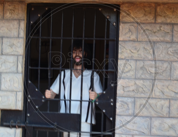 Image of An Convict in a Jail Room Behind Bars Model In Ramoji Film ...