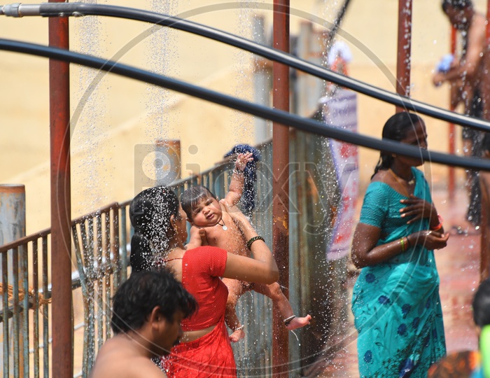 Image of Pilgrims Taking Bath At Showers Arranged By Krishna River Bank ...