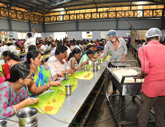 Image of Volunteers Serving Food For Devotees Called As Annadanam Or ...