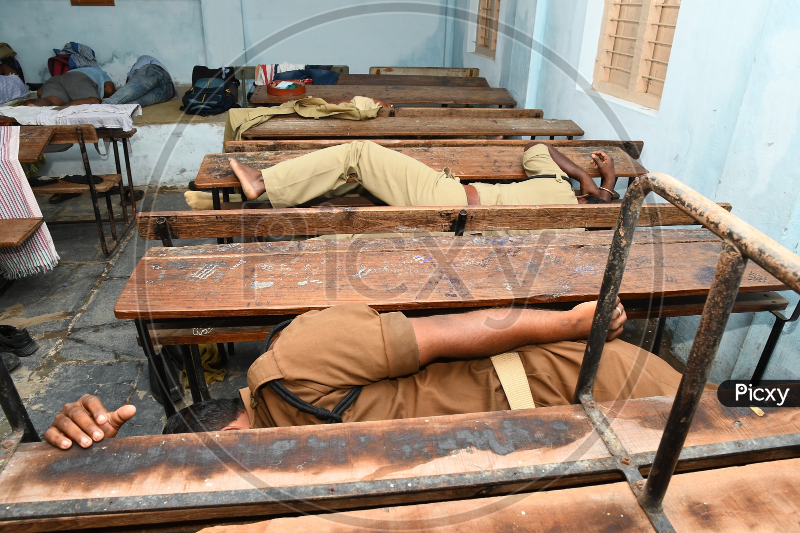Image of Police Sleeping on School Benches After Duty During Durga ...