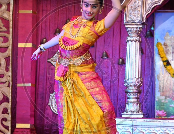 Image of Traditional Bharathanatyam Dancer Dancing On Stage With ...