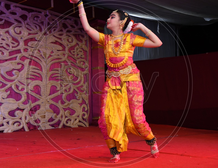 Image of Traditional Bharathanatyam Dancer Dancing On Stage With ...