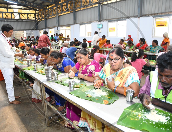 Image of Volunteers Serving Food For Devotees Called As Annadanam Or ...