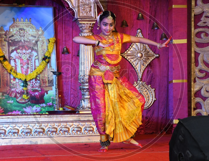 Image of Traditional Bharathanatyam Dancer Dancing On Stage With ...