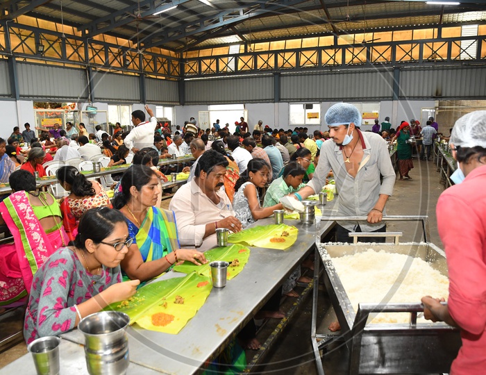 Image of Volunteers Serving Food For Devotees Called As Annadanam Or ...