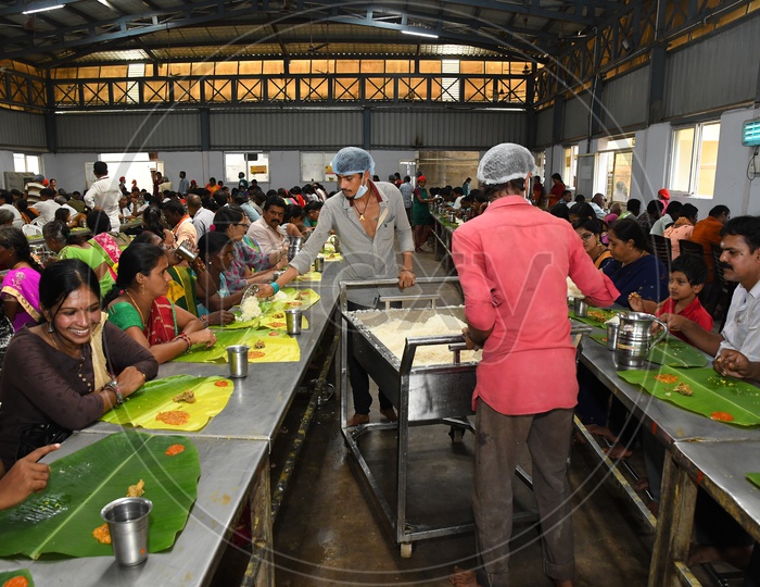 Image of Volunteers Serving Food For Devotees Called As Annadanam Or ...