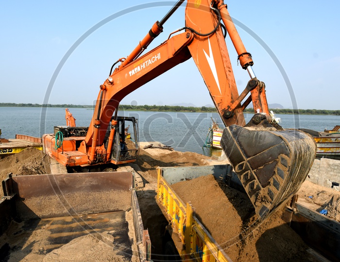 Image of Sand Mining Activities or Dredging At River Or Lake Bed , Sand ...