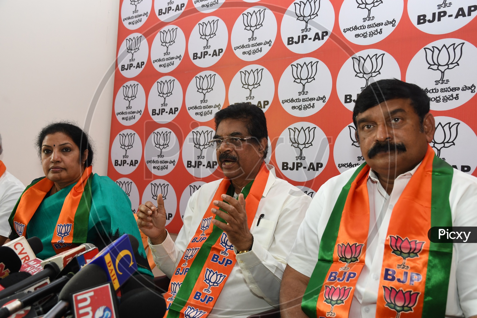 Image of BJP Member Hari Babu Kambhampati and Daggubati Purandeswari in a Press Meeting-FS786637 ...