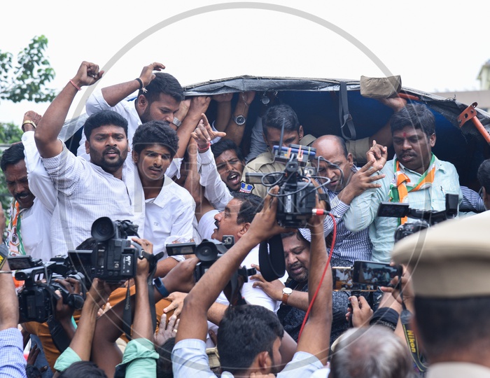 Image of Congress Party workers being detained into a van by Telangana ...