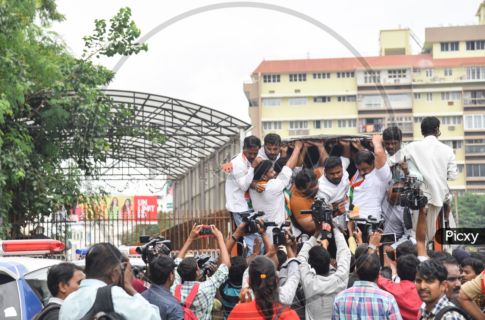 Image of Congress Party workers being detained into a van by Telangana ...