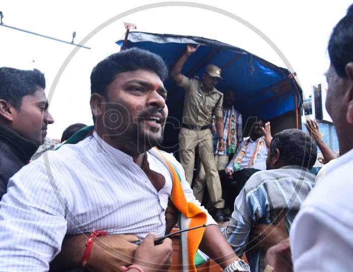 Image of Congress Party workers being detained into a van by Telangana ...