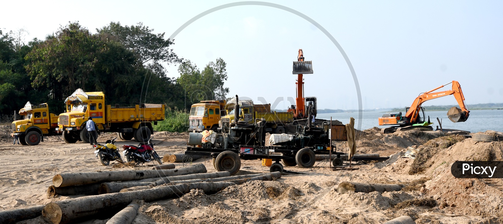 Image of Sand Mining Activities or Dredging At River Or Lake Bed , Sand ...