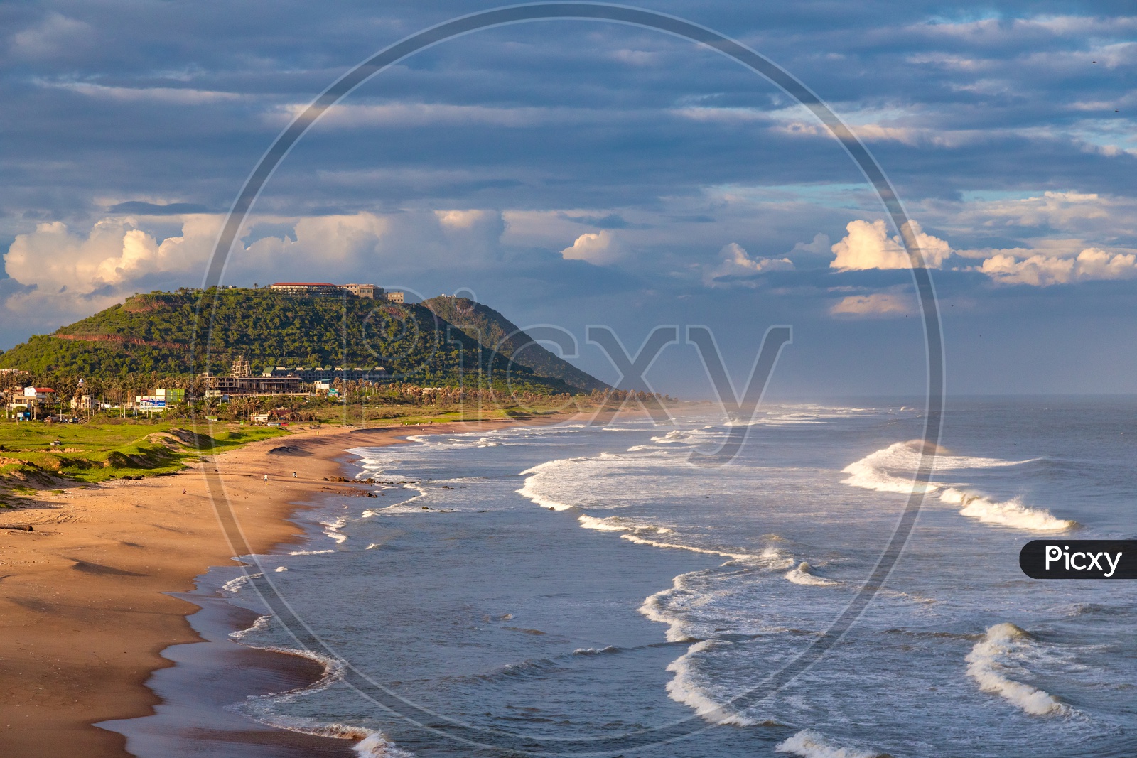 Image of Visakhapatnam Beach View on a Sunny day with Blue Clouds in ...