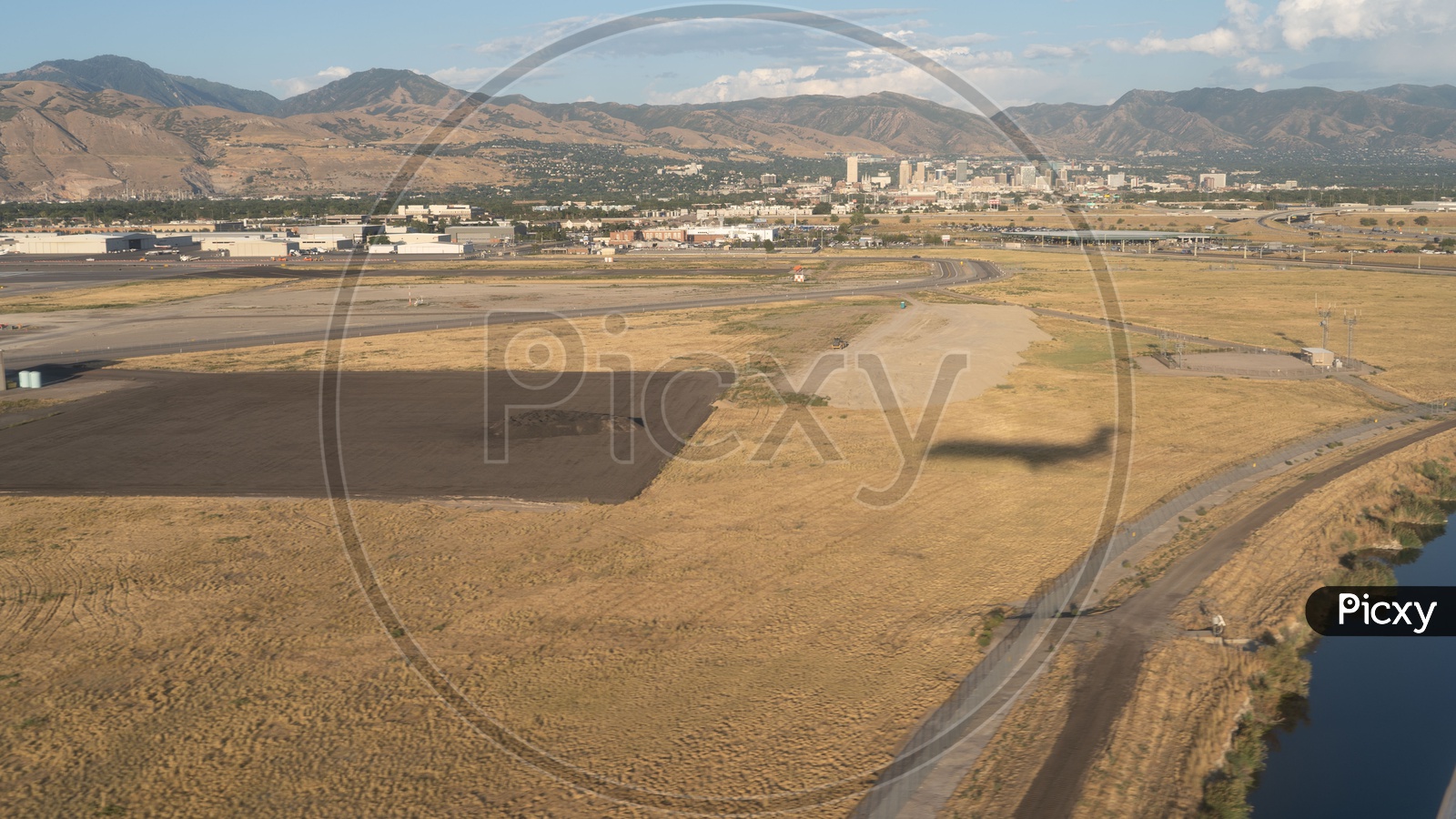 Image of Aerial view of Empty Land alongside the Canal Network in Salt ...
