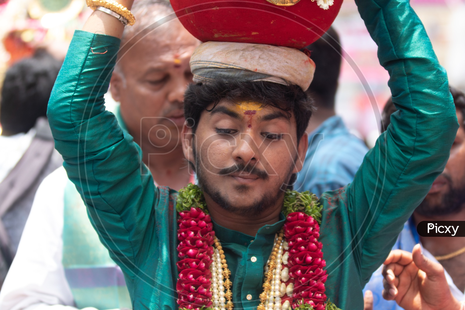 Image of Hindu Devotees Carrying Bonam On Head During Bonalu Festival ...