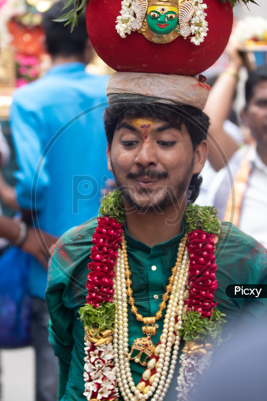 Image of Hindu Devotees Carrying Bonam On Head During Bonalu Festival ...