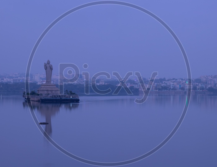 Image of Silhouette Of Gautham Buddha Statue In Hussain Sagar Lake And ...